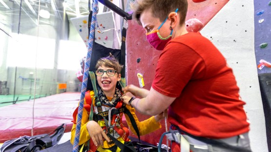 People with disabilities reach new heights at climbing wall | Cornell ...